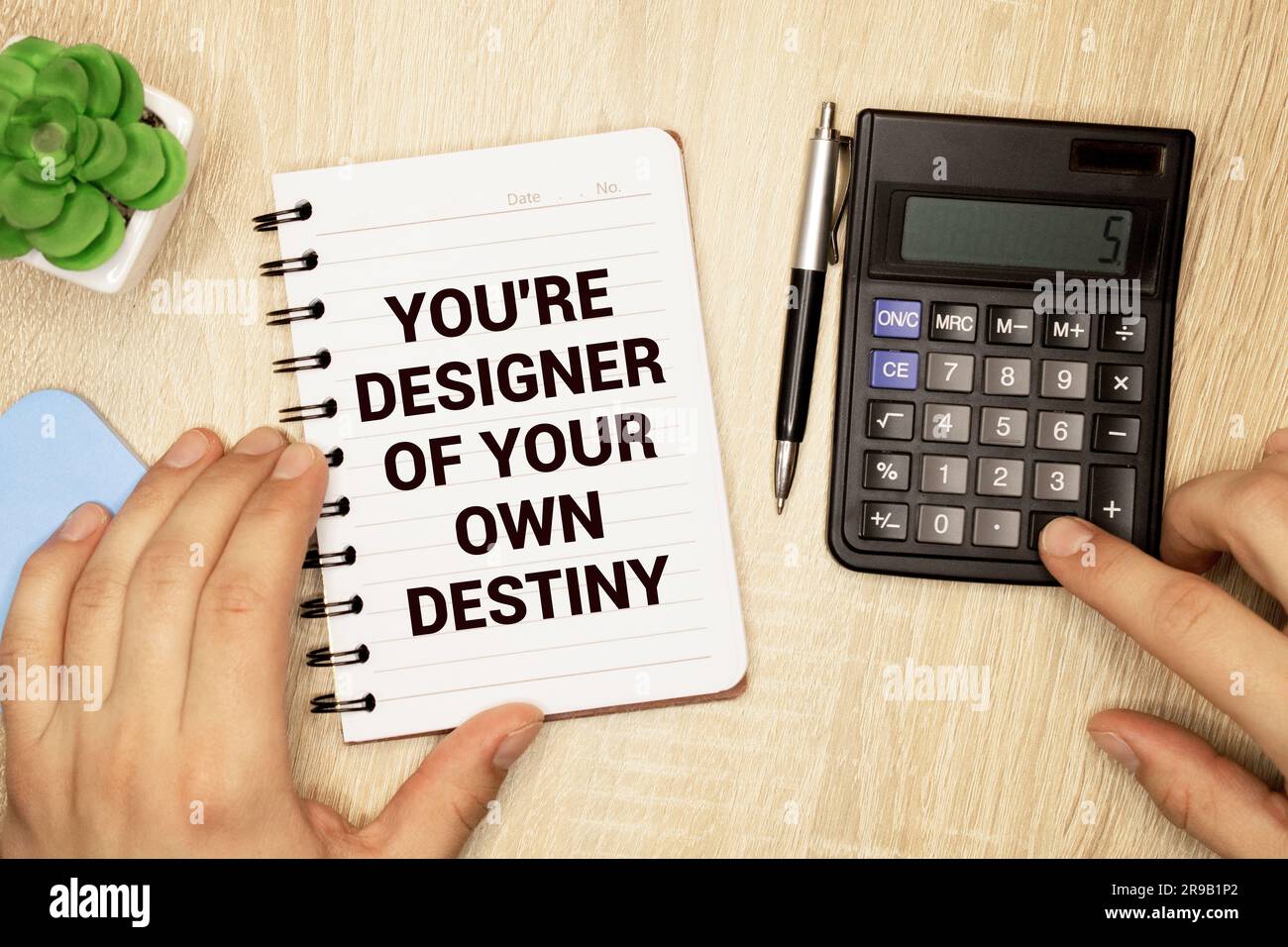 you're designer of your own destiny words on spring white note book ...