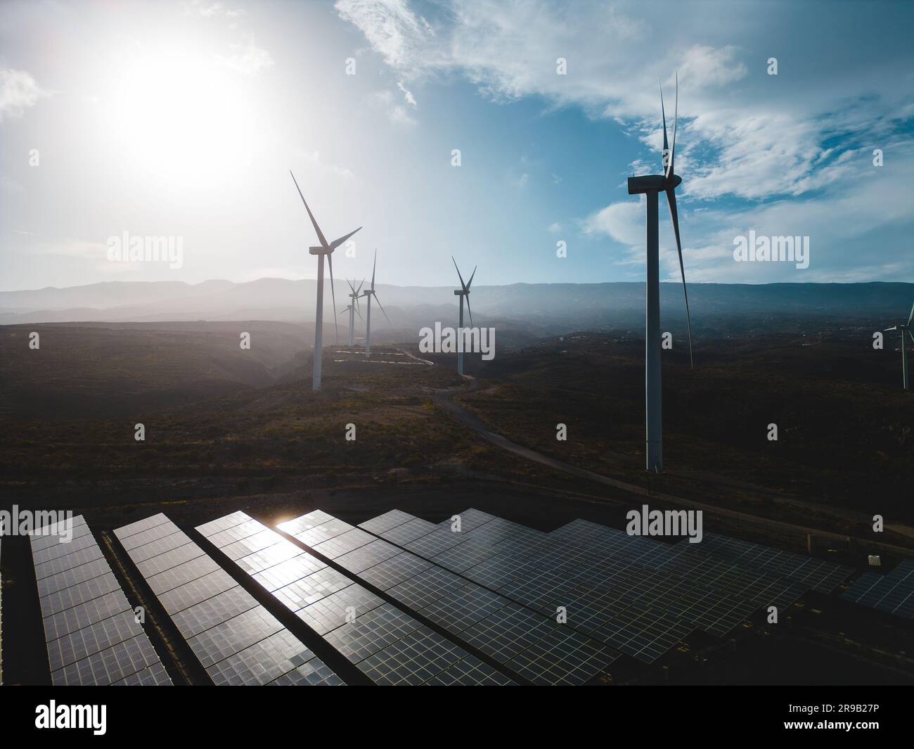 Windmill producing renewable energy aerial hi-res stock photography and ...