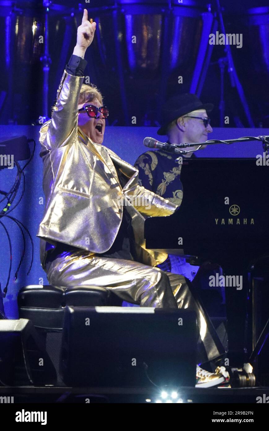 EDITORIAL USE ONLY Elton John performing on the Pyramid Stage at the ...