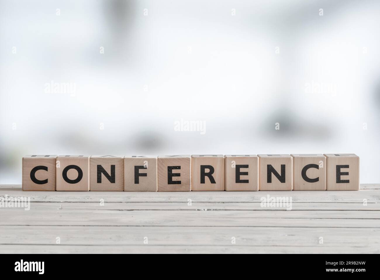 Conference sign on a desk in a bright office Stock Photo - Alamy