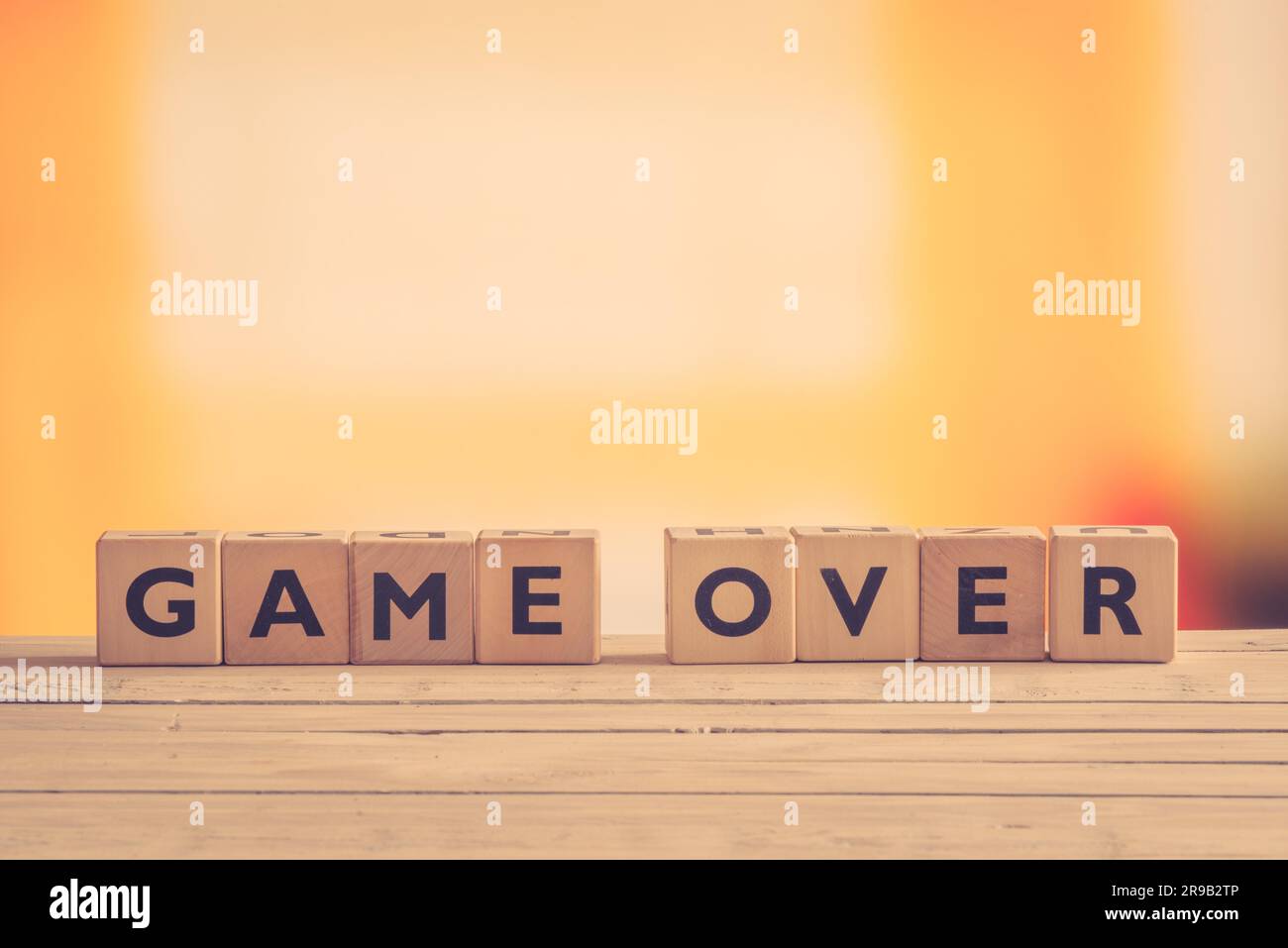 Game over sign on a table in retro colors Stock Photo - Alamy