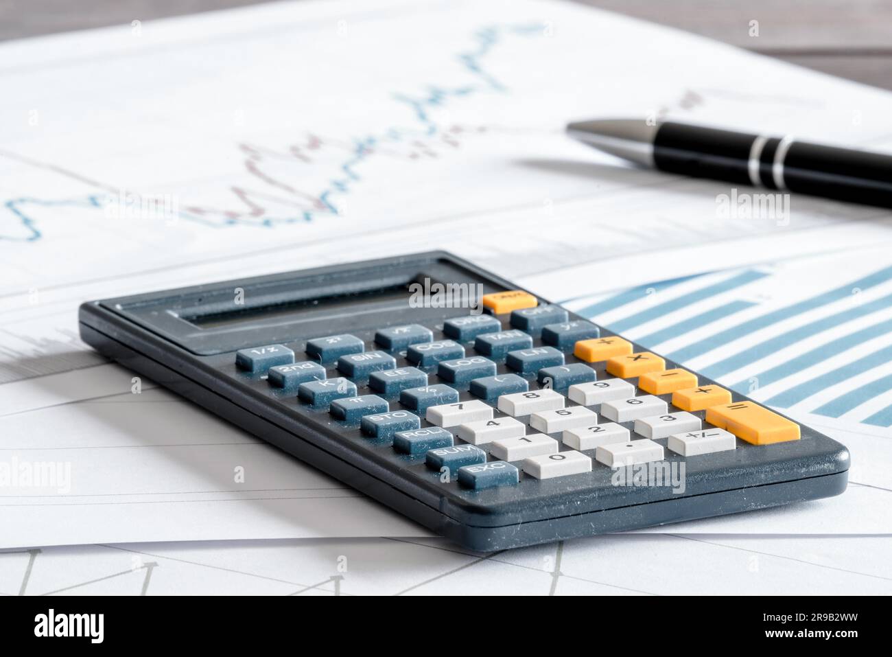 Calculator on some paper diagrams in an office Stock Photo - Alamy