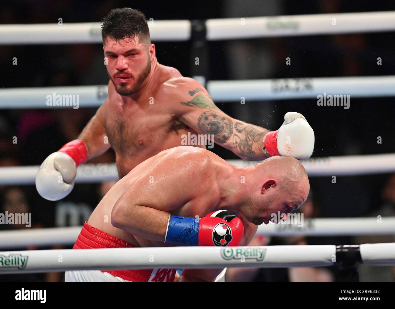 NEW YORK, NY - JUN 24: Adam Kownacki (blue tape) takes on Joe Cusumano ...