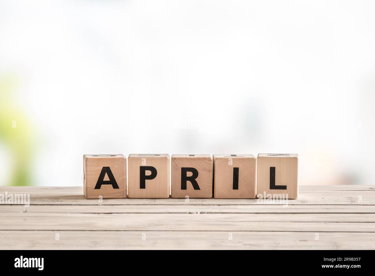 April sign with wooden cubes in the spring Stock Photo - Alamy