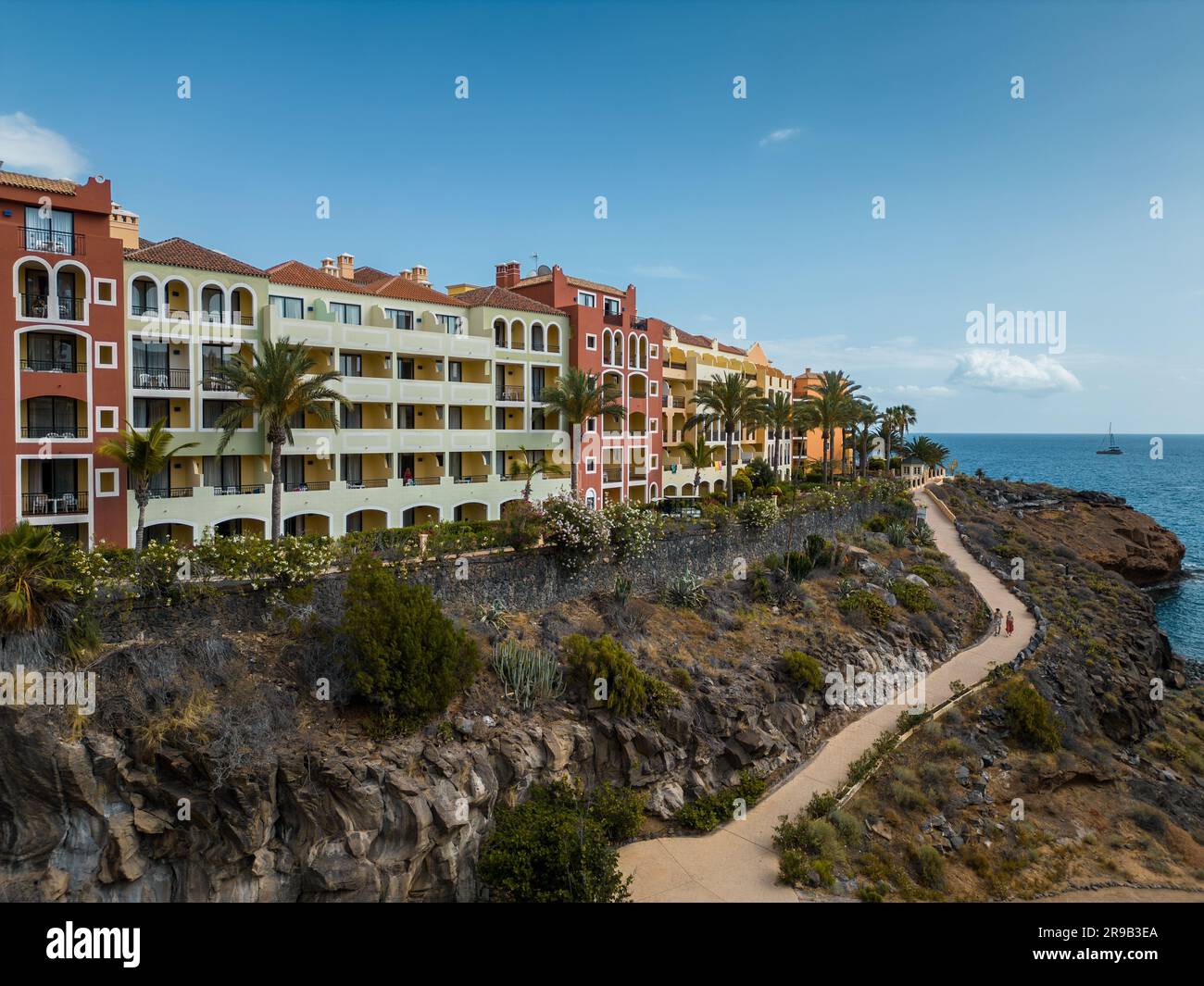 cozy colorful town with houses, hotels and resorts on cliff, Tenerife ...