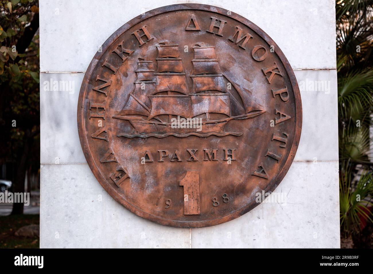 Athens, Greece - 25 Nov 2021: One Greek Drachma Coin statue in front of ...