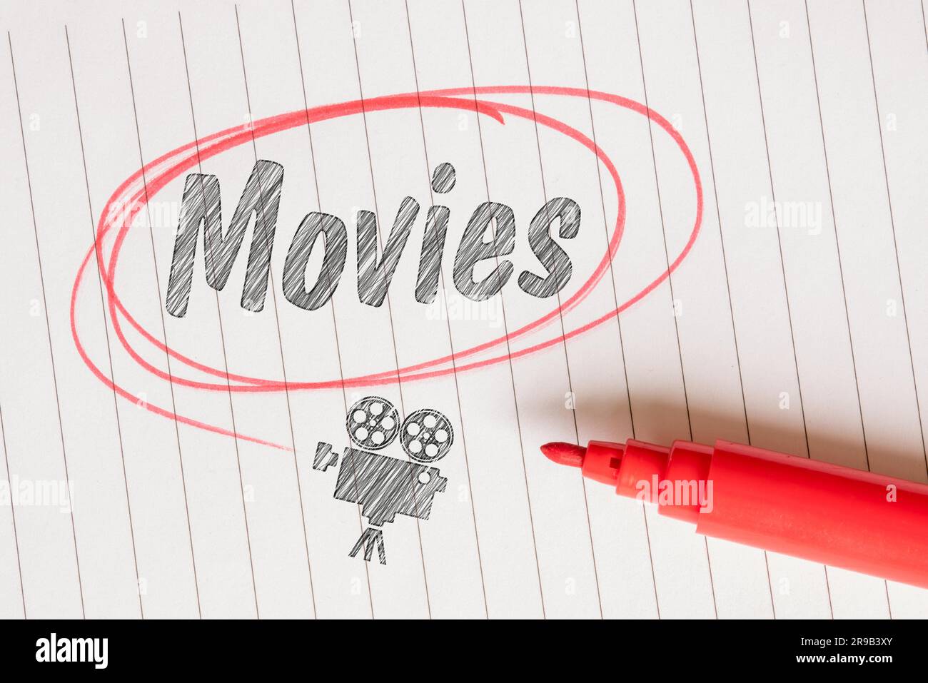 Movies note with a red circle and a film projector sketch Stock Photo ...