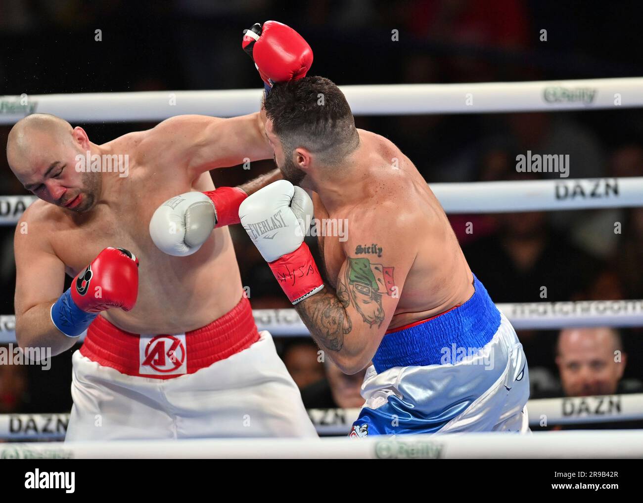 NEW YORK, NY - JUN 24: Adam Kownacki (blue tape) takes on Joe Cusumano ...