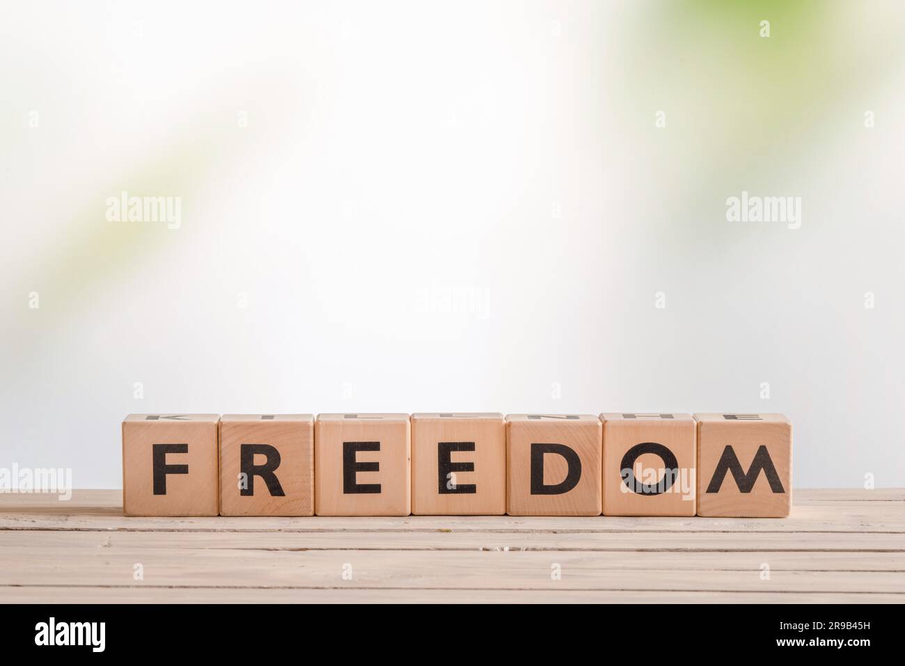 Freedom sign on a table in bright environment Stock Photo - Alamy