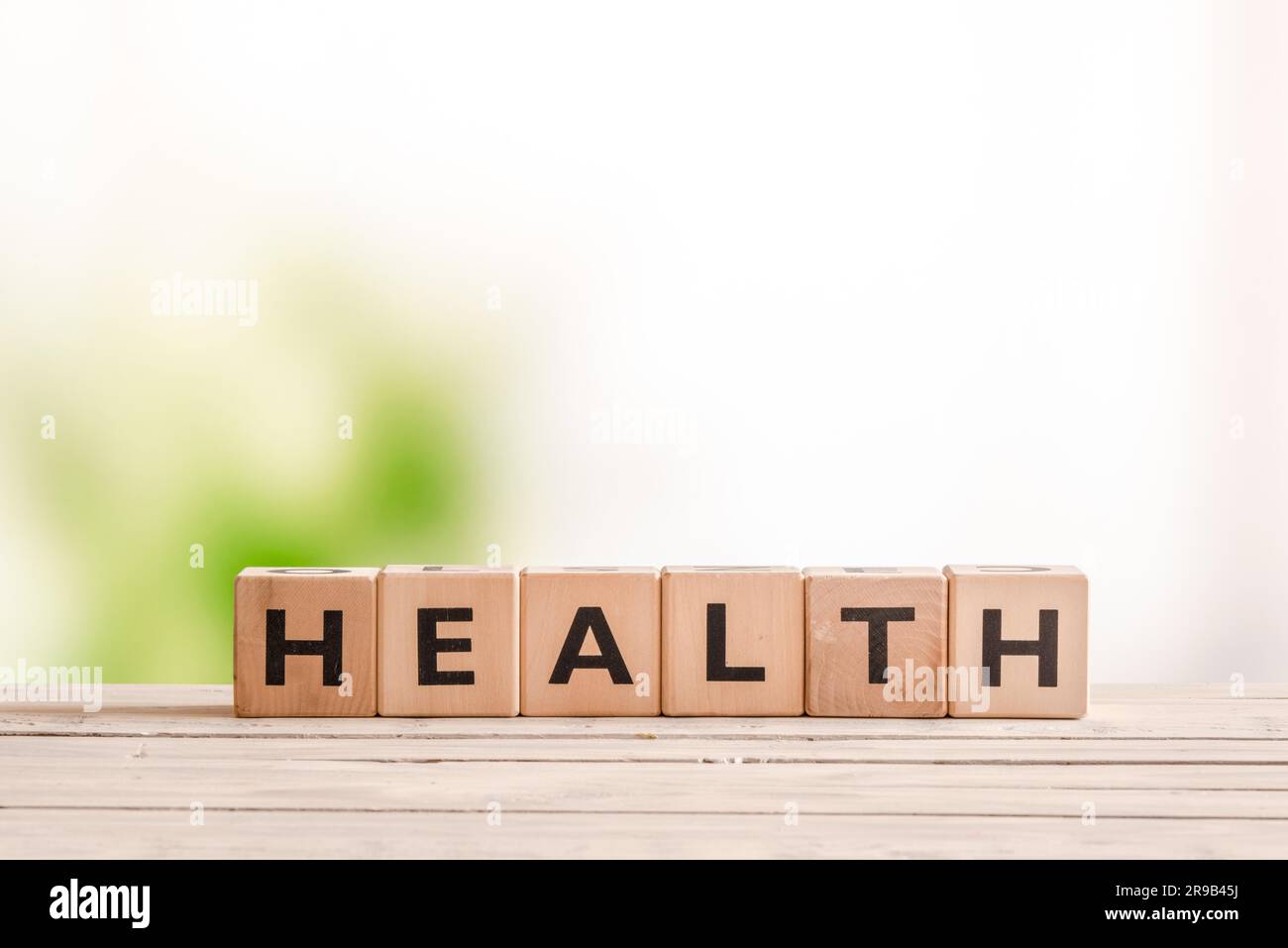 Health sign made of wood on a natural desk Stock Photo - Alamy