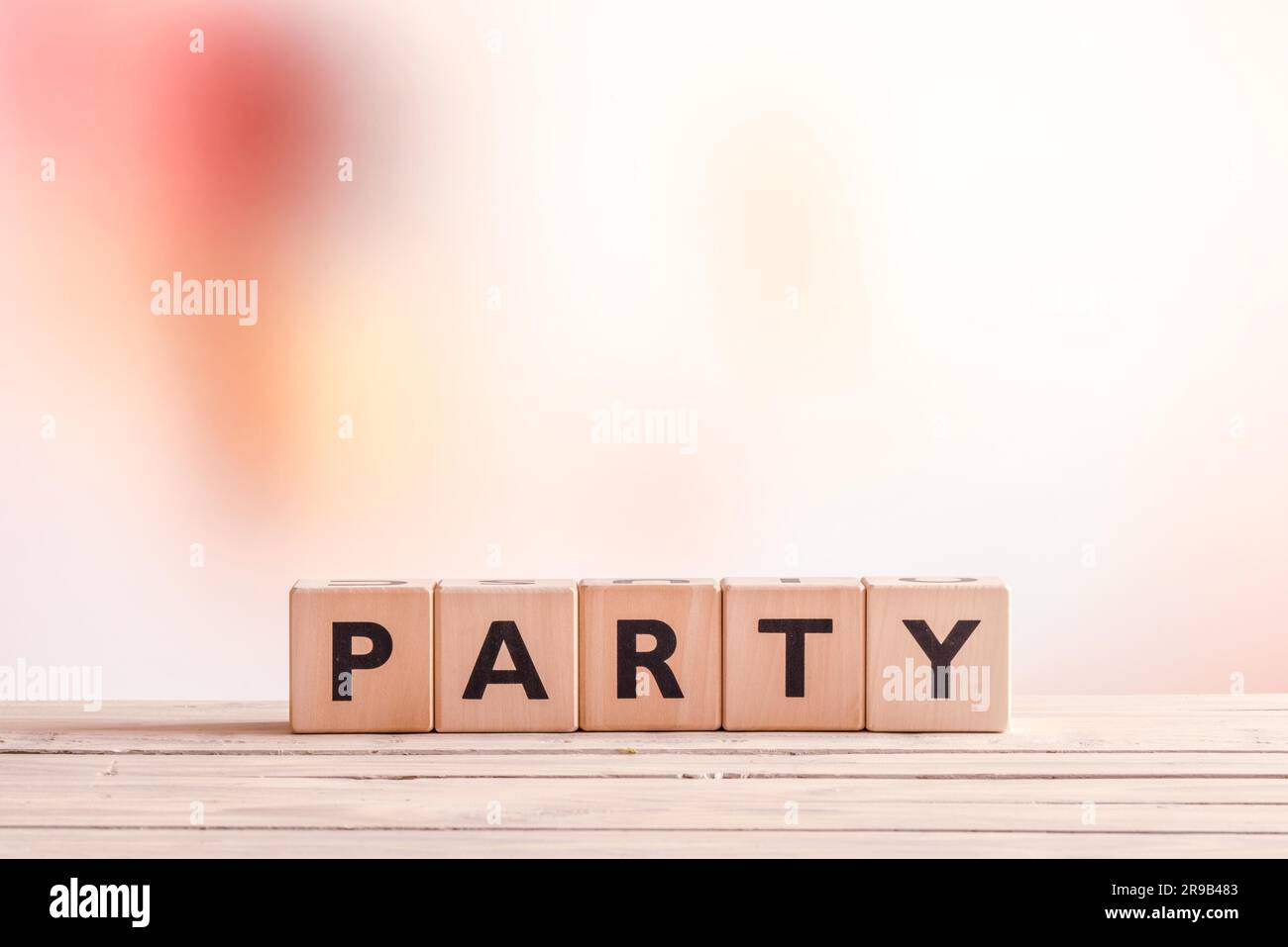 Party sign made of wood on an indoor table Stock Photo - Alamy