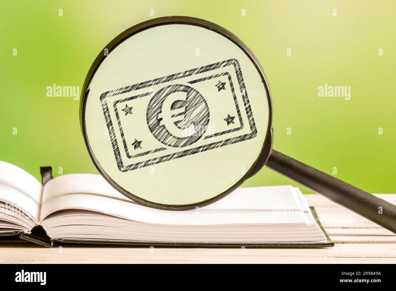 Euro information with a pencil drawing of a chain link in a magnifying ...
