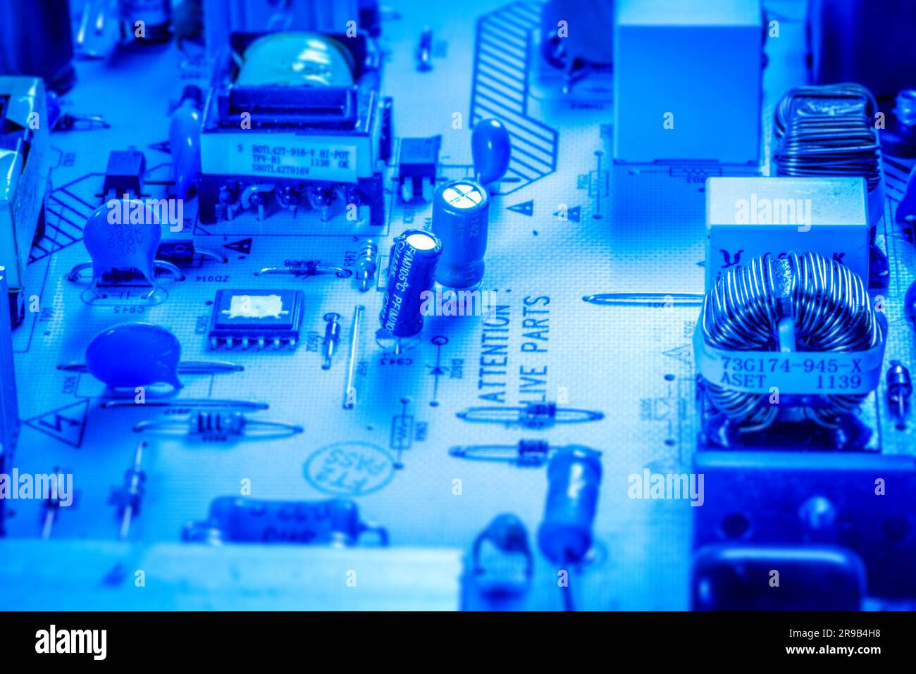 Microcircuit board with chips and capacitors in blue color Stock Photo ...