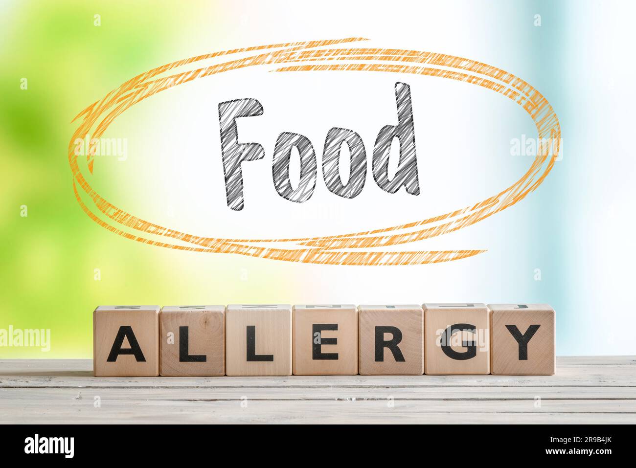 Food allergy sign on a table with a nature background Stock Photo - Alamy