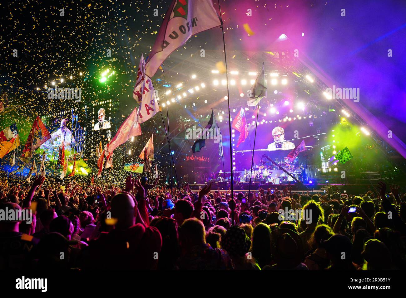 EDITORIAL USE ONLY Elton John performing on the Pyramid Stage at the ...