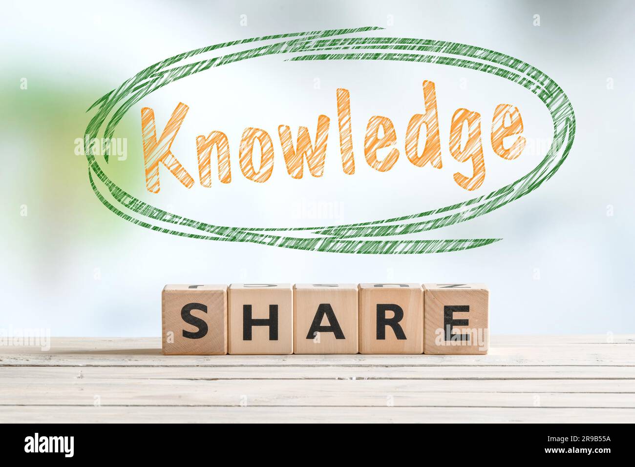 Share knowledge sign on a table with a sketch Stock Photo - Alamy