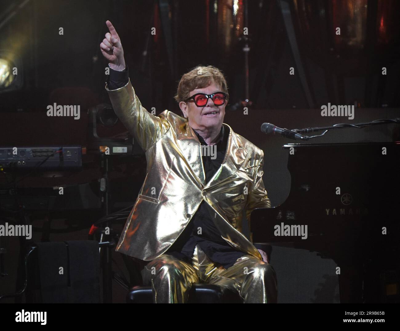 EDITORIAL USE ONLY Elton John performing on the Pyramid Stage at the ...