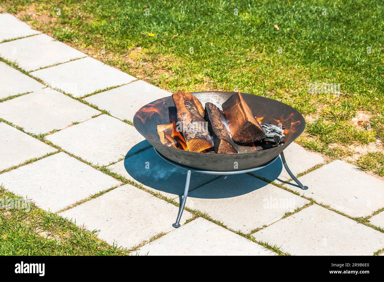 Garden bonfire in a garden in the summer Stock Photo - Alamy