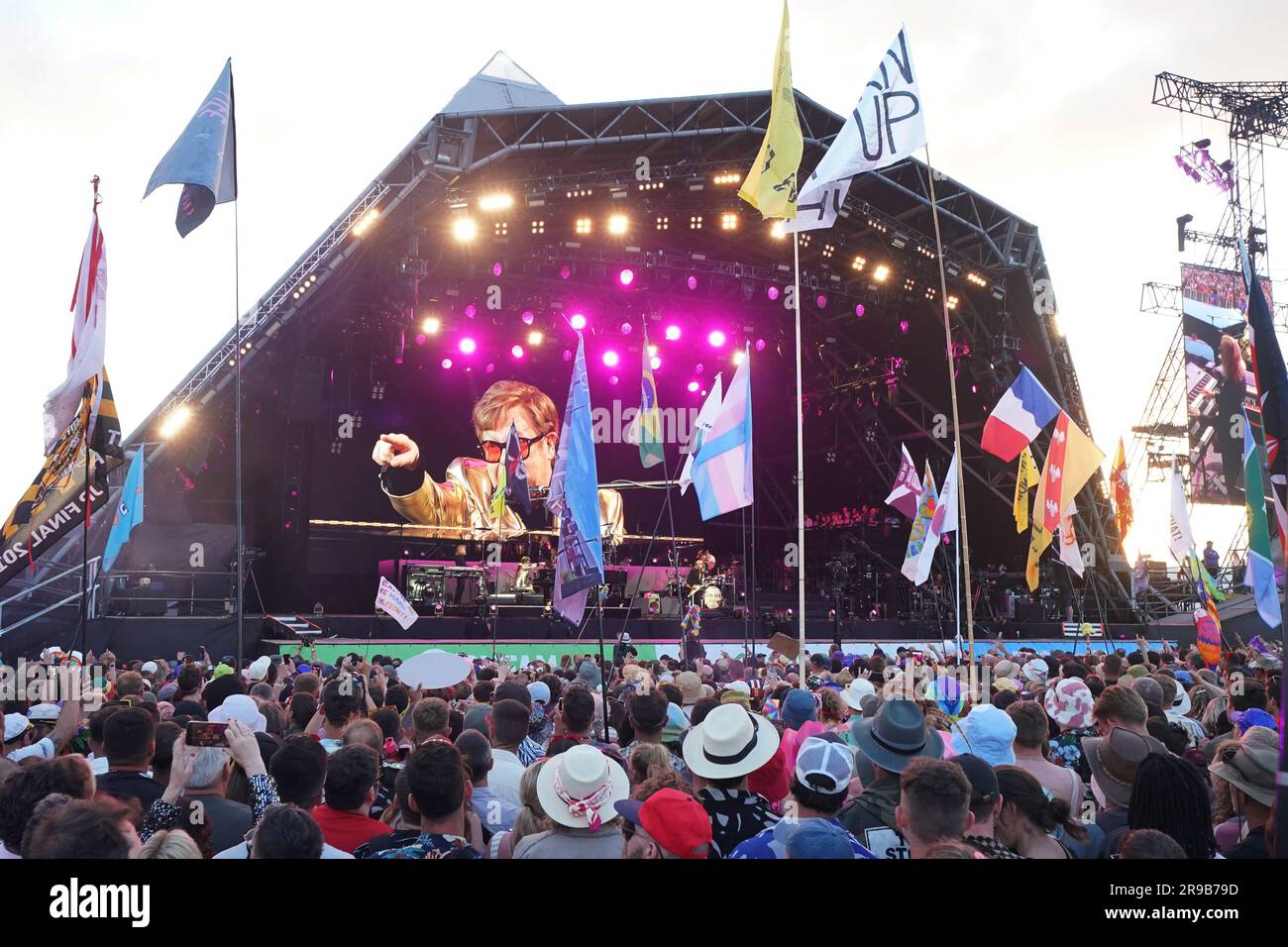 EDITORIAL USE ONLY Elton John performing on the Pyramid Stage at the ...