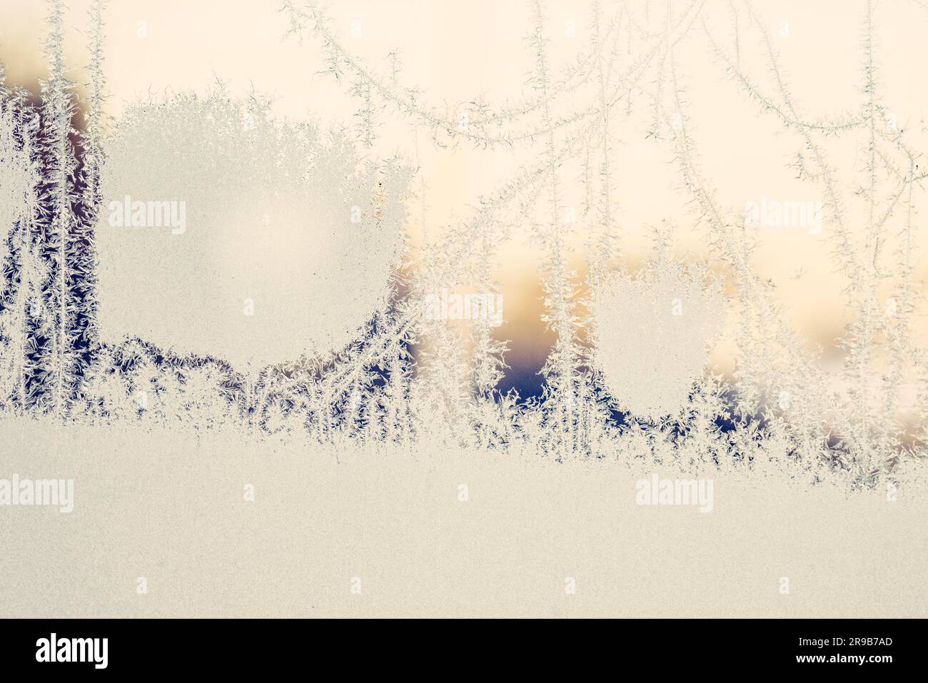 Frozen ice on a window in the sunrise on a December morning Stock Photo ...