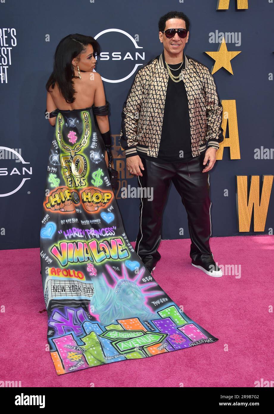 Vina Love, left, and Kid Capri arrive at the BET Awards on Sunday, June ...