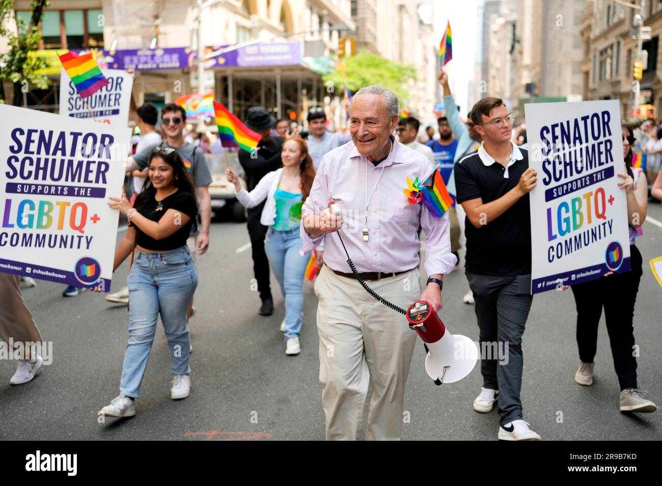 New York Sen. Chuck Schumer walks in the NYC Pride March on Sunday ...