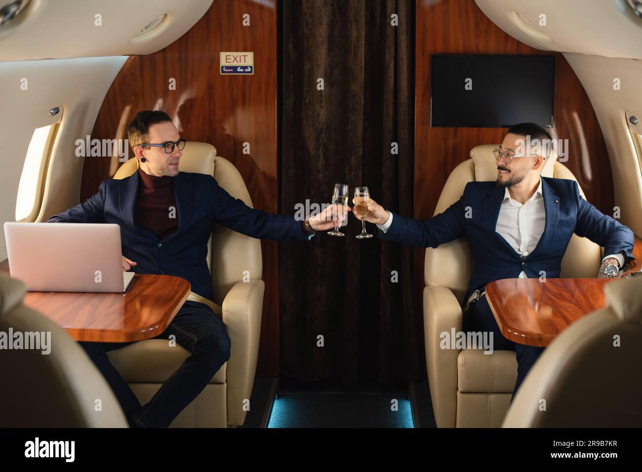 Couple flying business class hi-res stock photography and images - Alamy