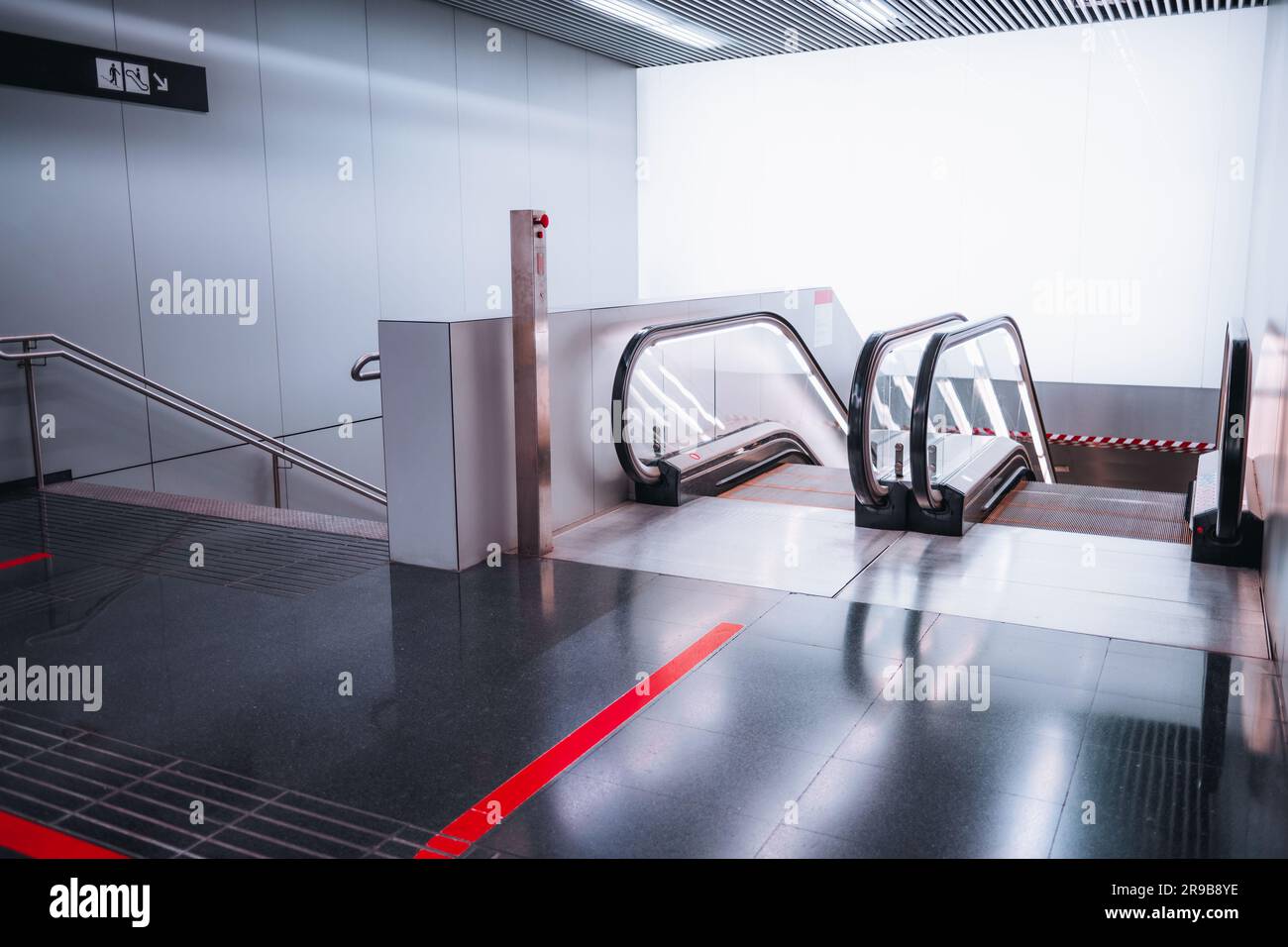 Indoor shot, a modern ambiance. The predominantly grey environment is ...