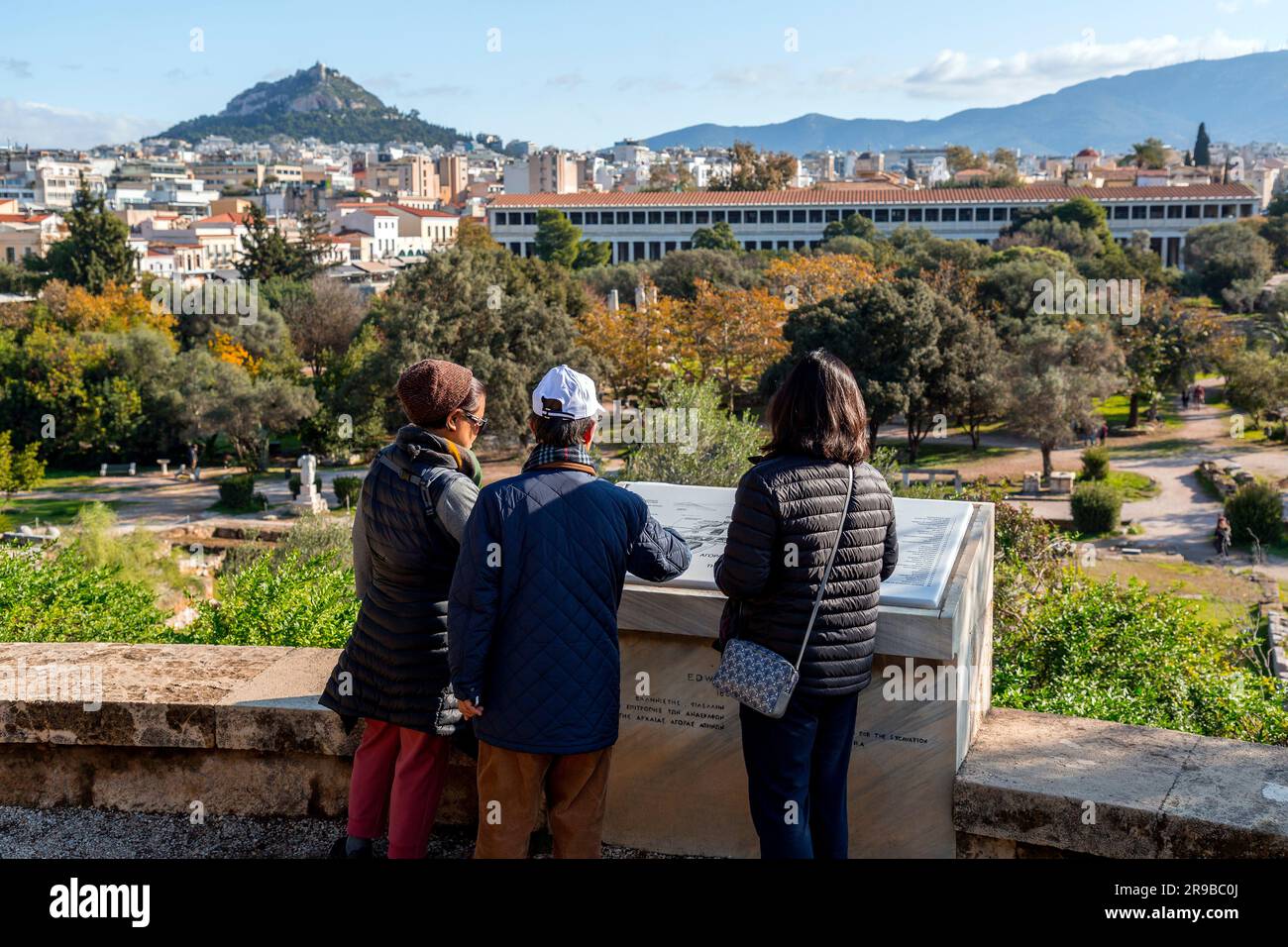 Athens, Greece - 25 Nov 2021: Visitors observing the ancient Agora of ...
