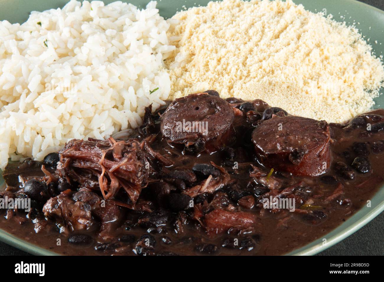 Feijoada. Brazilian traditional food dish. Grey background Stock Photo ...