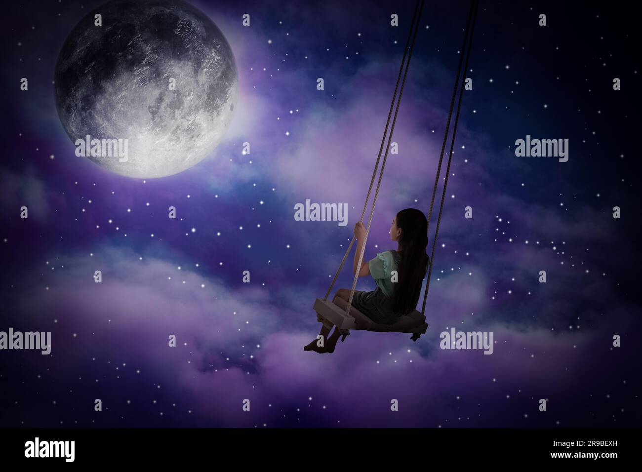 Sleepwalking condition. Girl on swing in night sky with full moon Stock ...