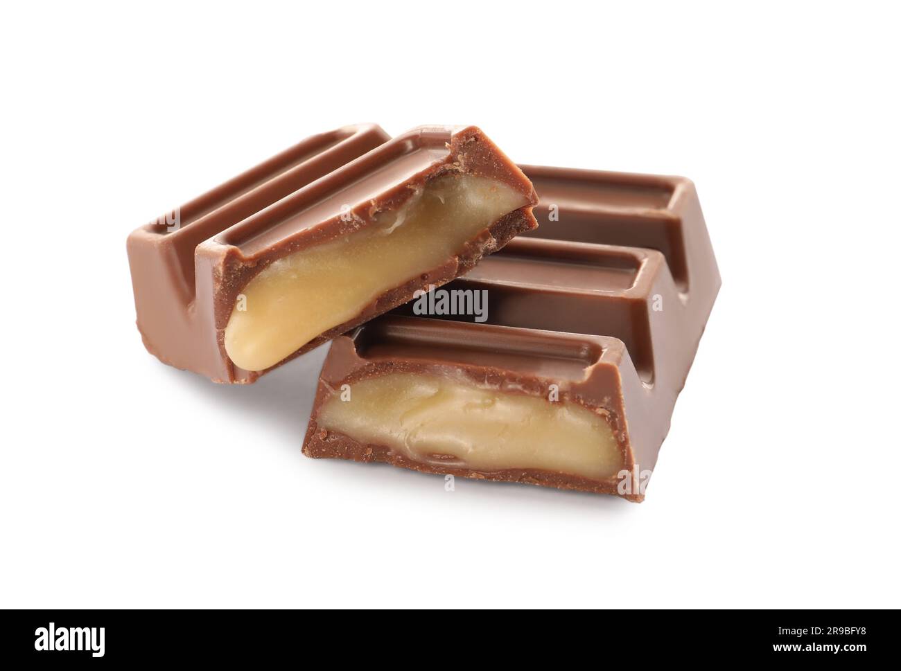 Pieces of delicious chocolate bar on white background Stock Photo - Alamy