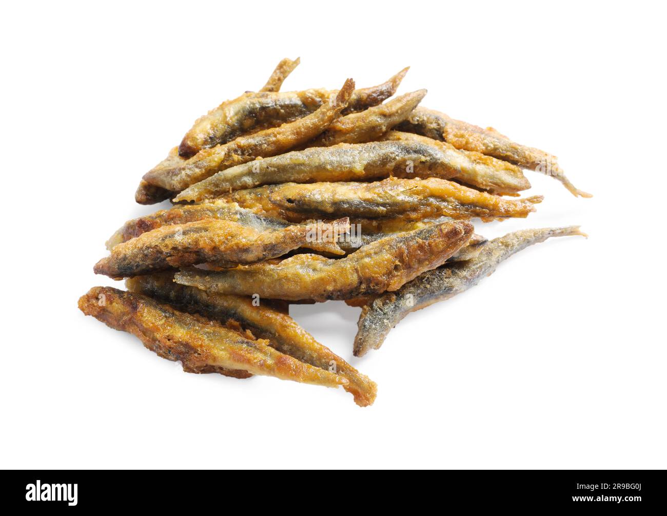 Pile of delicious fried anchovies on white background Stock Photo - Alamy