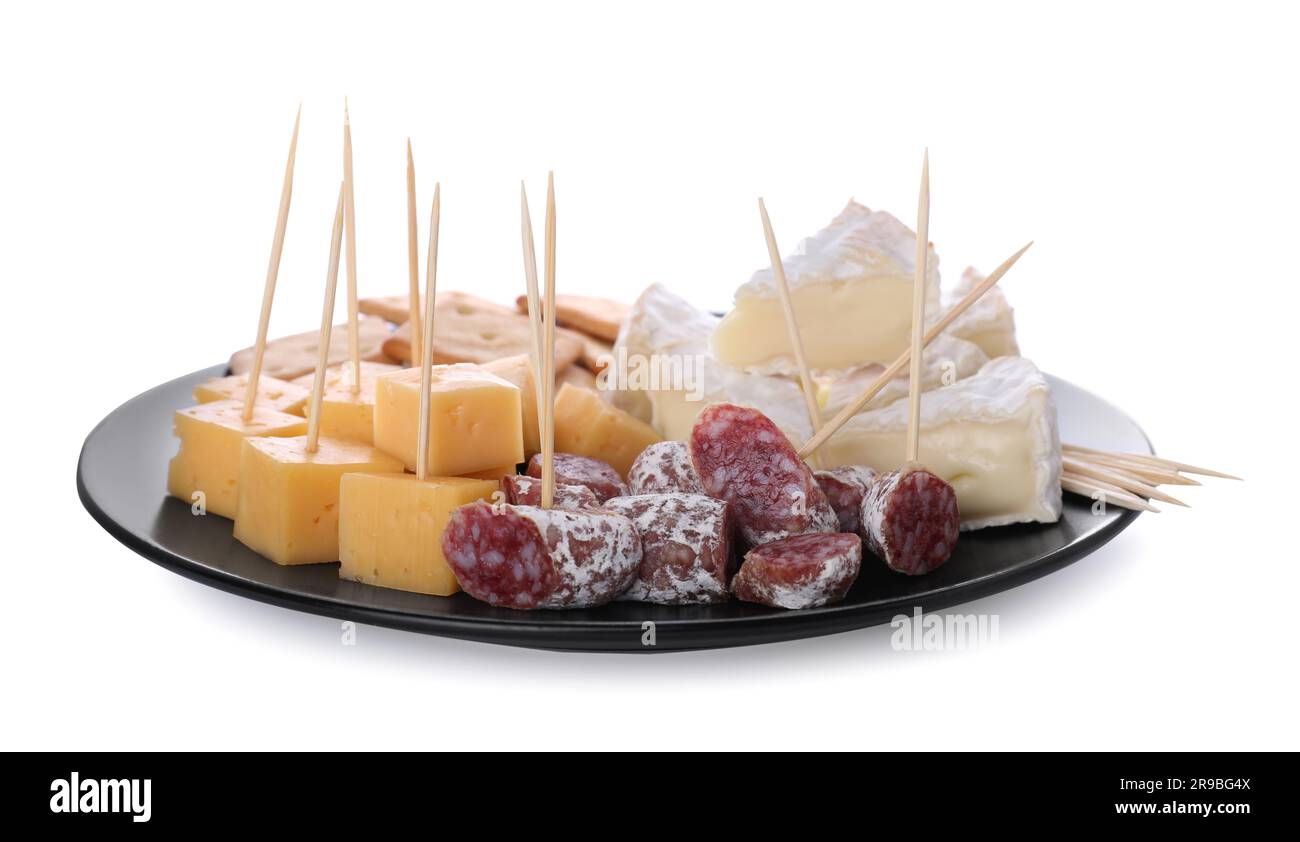 Toothpick appetizers. Tasty cheese, sausage, and crackers on white ...