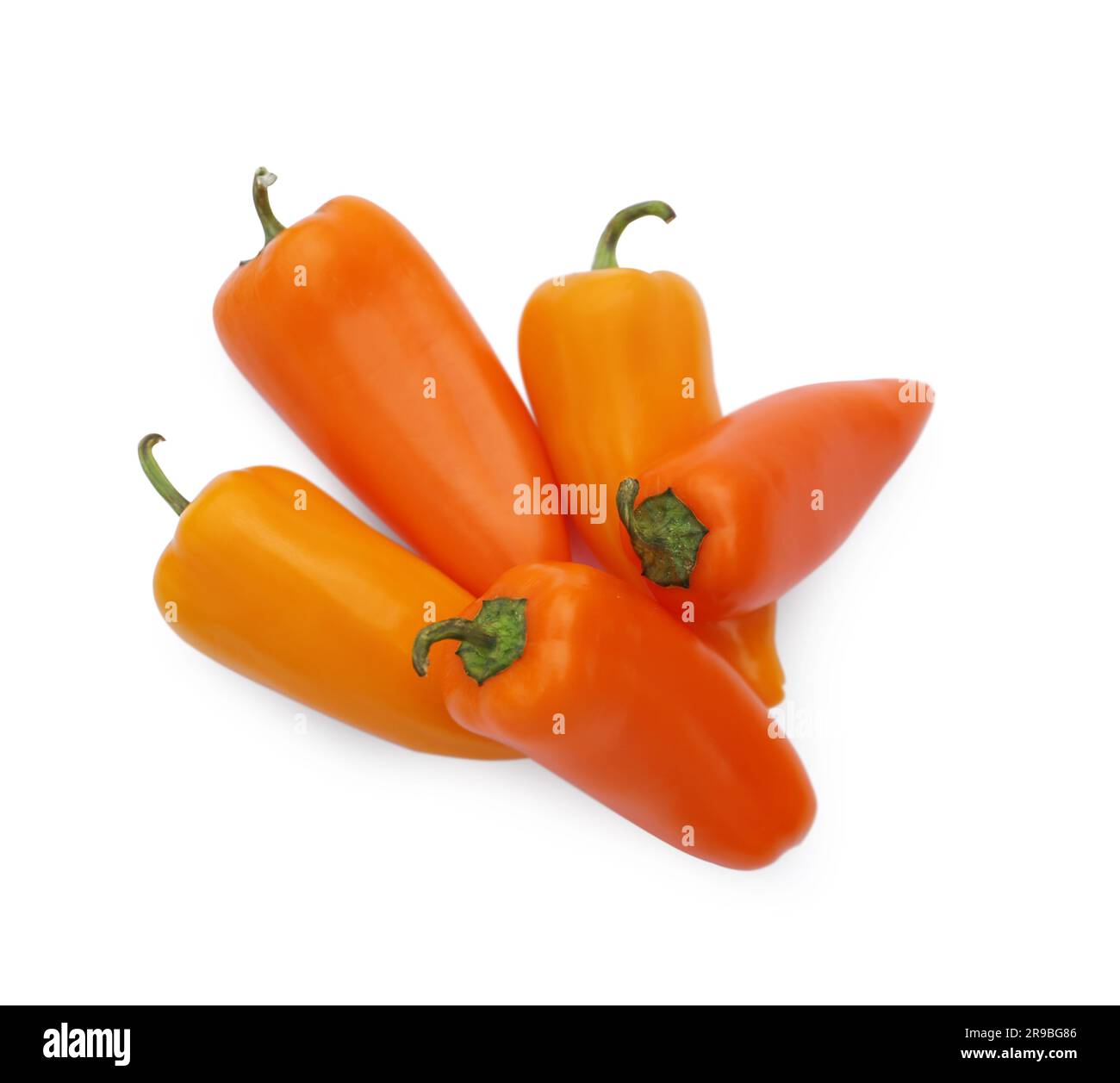 Fresh raw orange hot chili peppers isolated on white, top view Stock ...