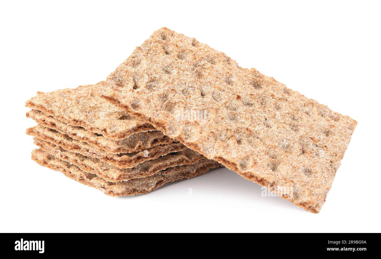 Many fresh crunchy crispbreads on white background. Healthy snack Stock ...