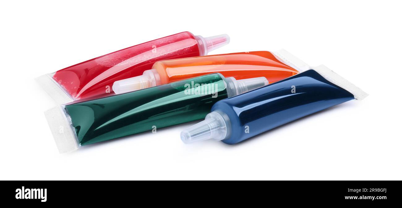 Tubes with different food coloring on white background Stock Photo - Alamy
