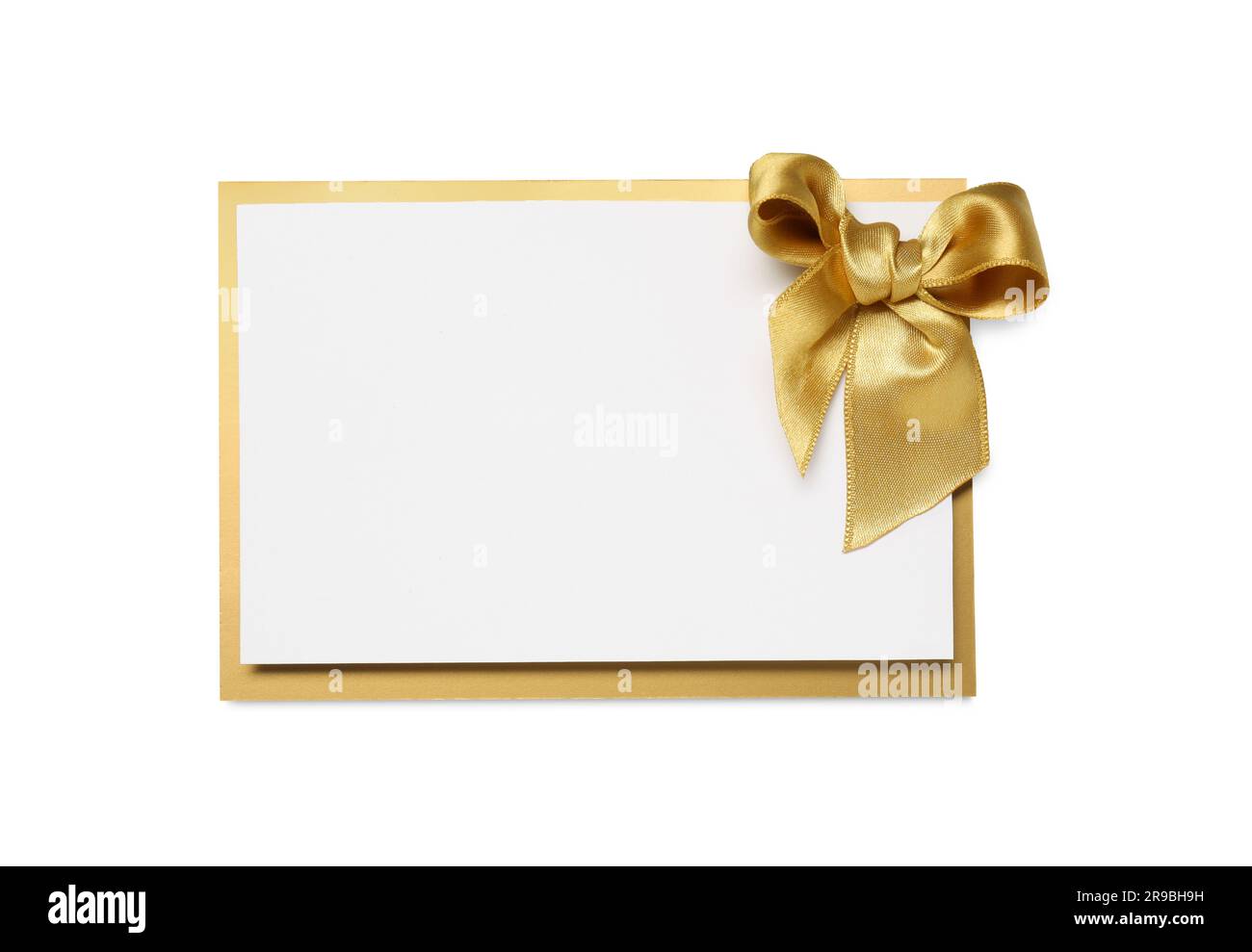 Blank gift card with golden bow isolated on white, top view Stock Photo ...