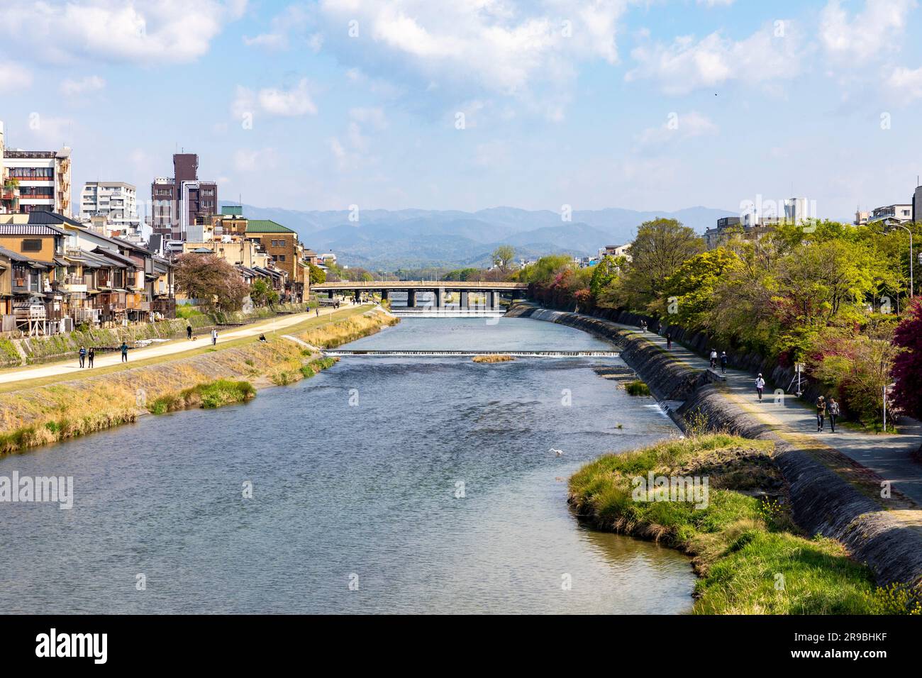 Kamo river in Kyoto, spring day 2023, blue sky over River kamo, people ...