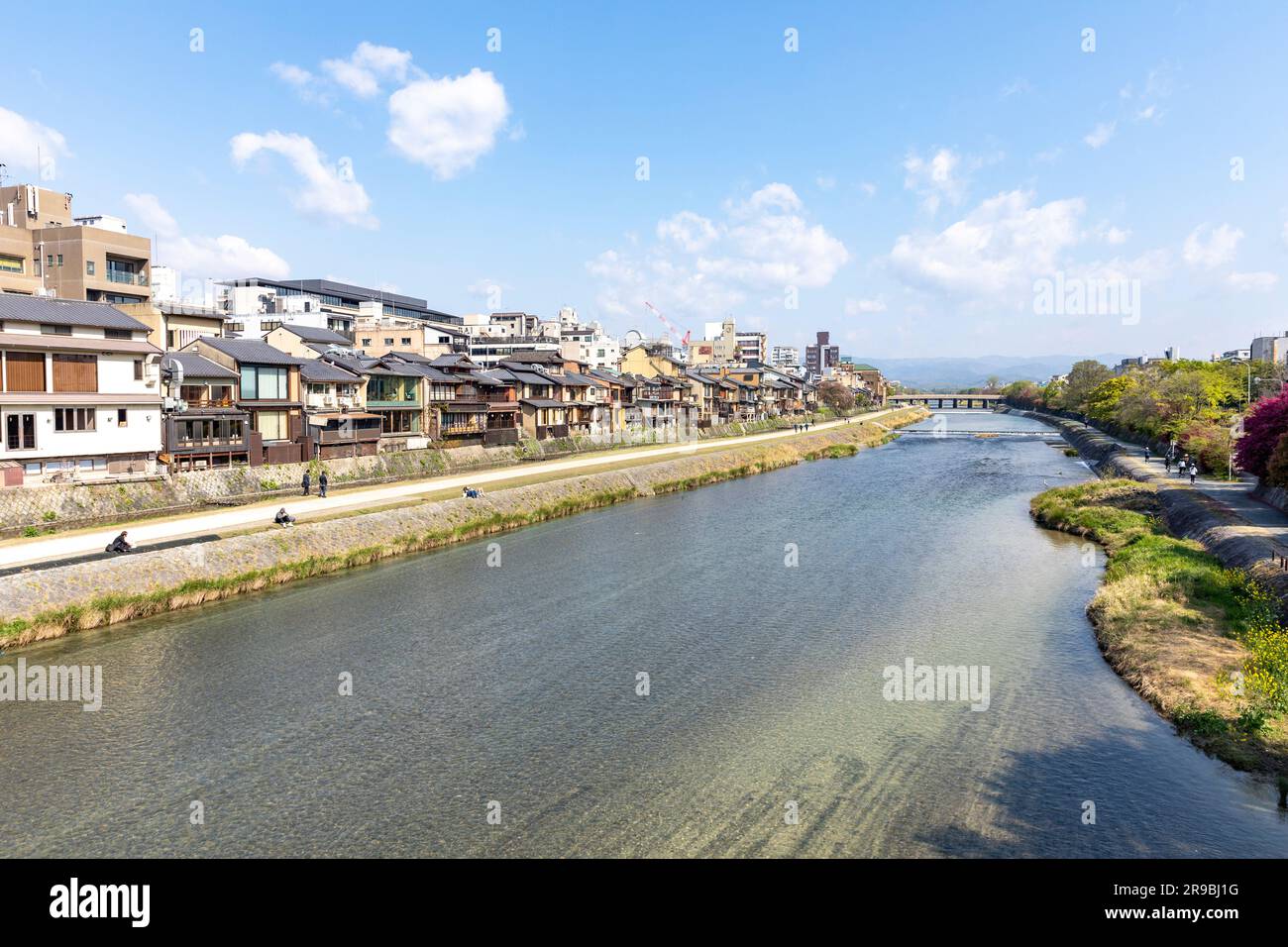 Kamo river in Kyoto, spring day 2023, blue sky over River kamo, people ...