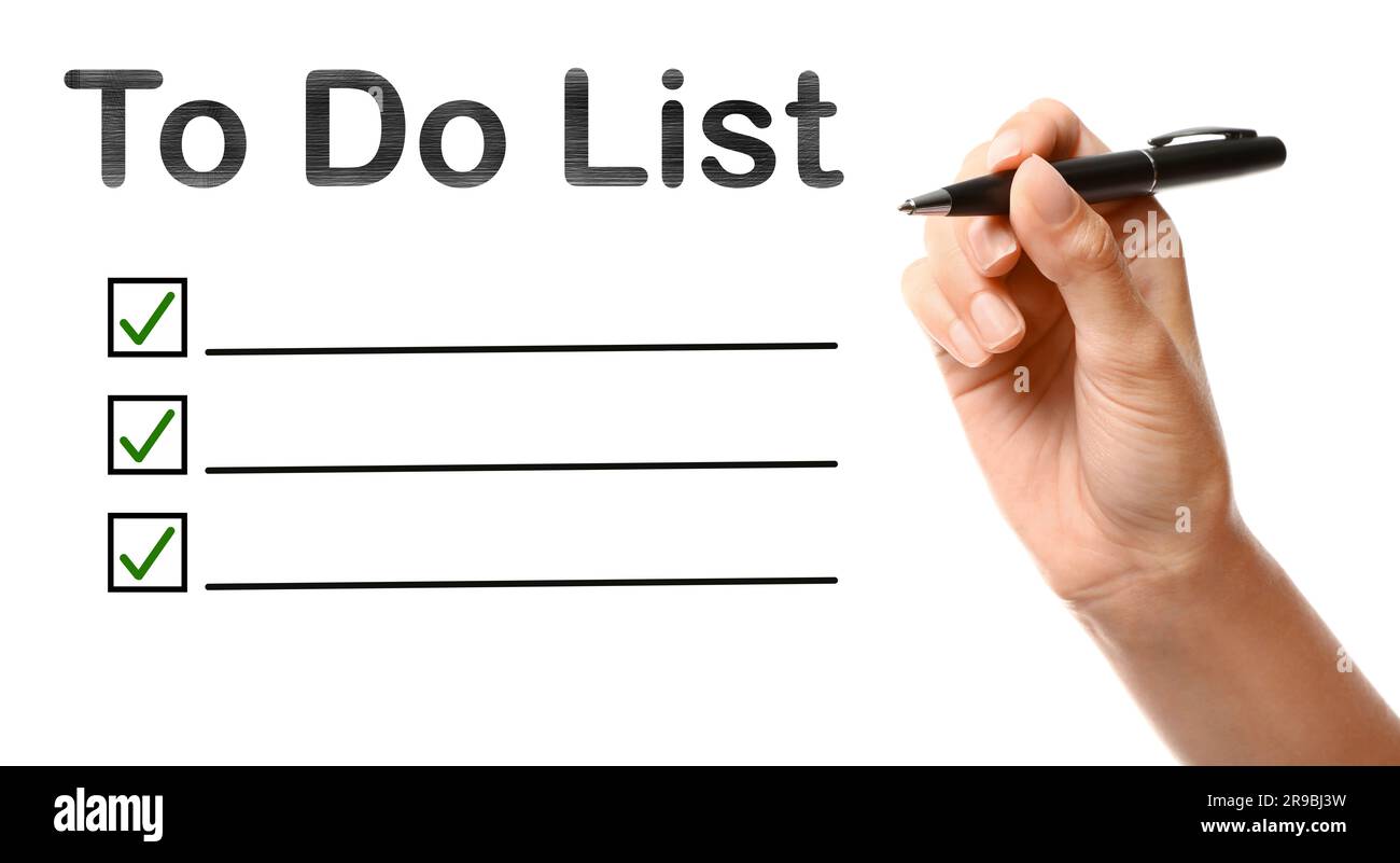Woman writing words To Do List on glass board against white background ...