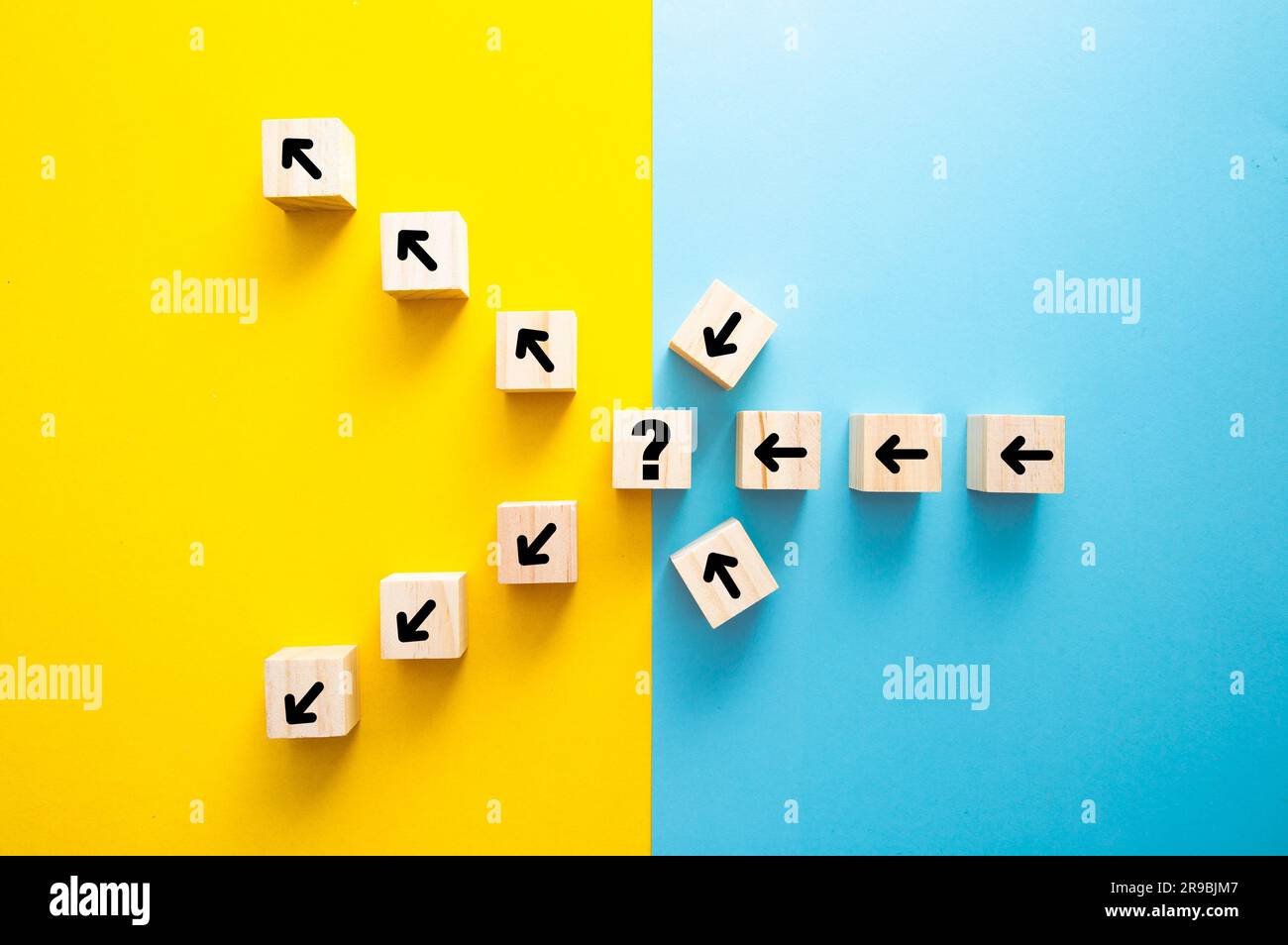 An arrangement of square blocks against blue and yellow backgrounds ...