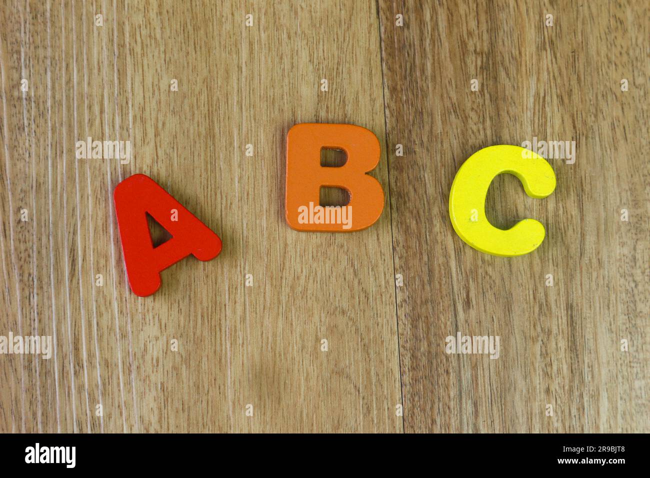 ABC - children's alphabet learning set on the wooden background Stock ...
