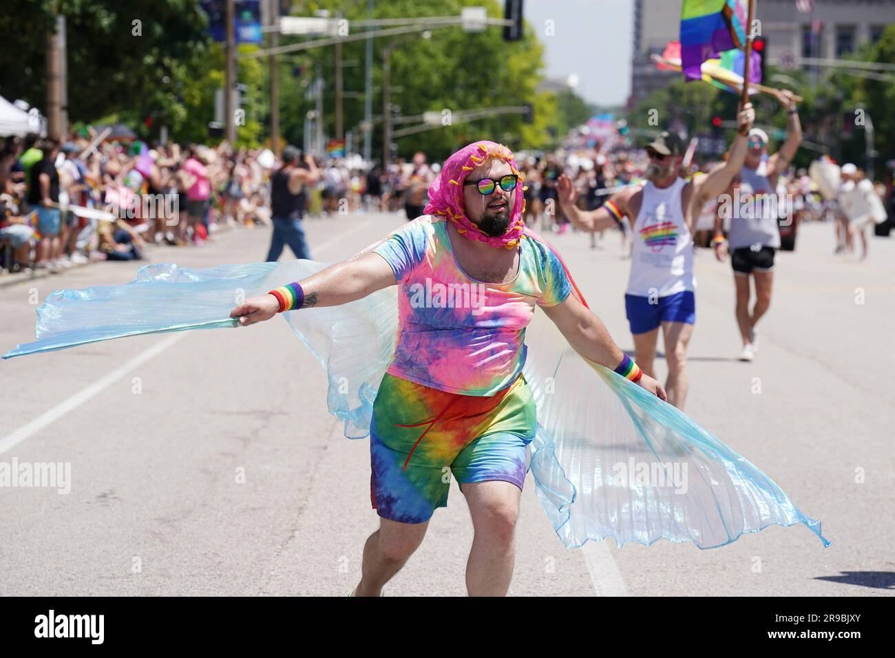 St. Louis, United States. 25th June, 2023. A parade participant walks ...