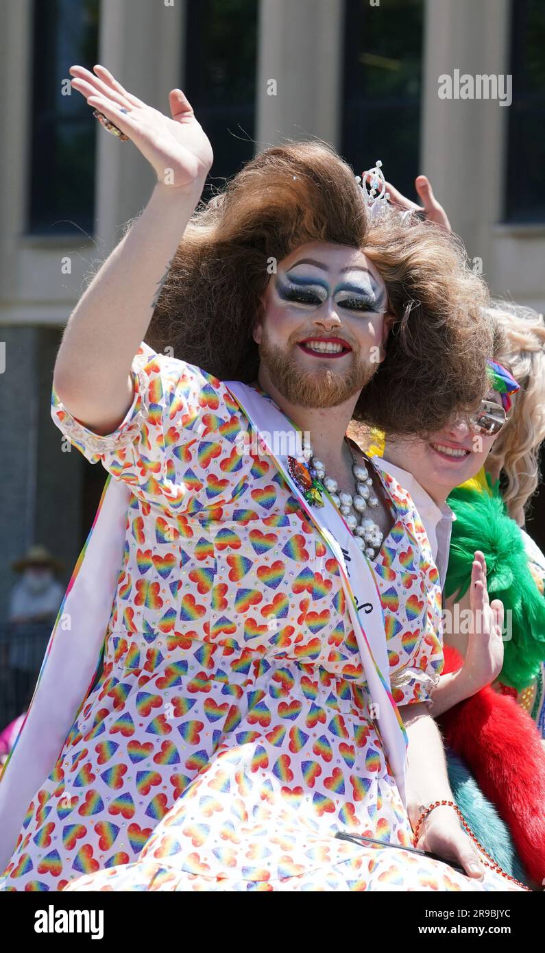 St. Louis, United States. 25th June, 2023. A parade participant waves ...