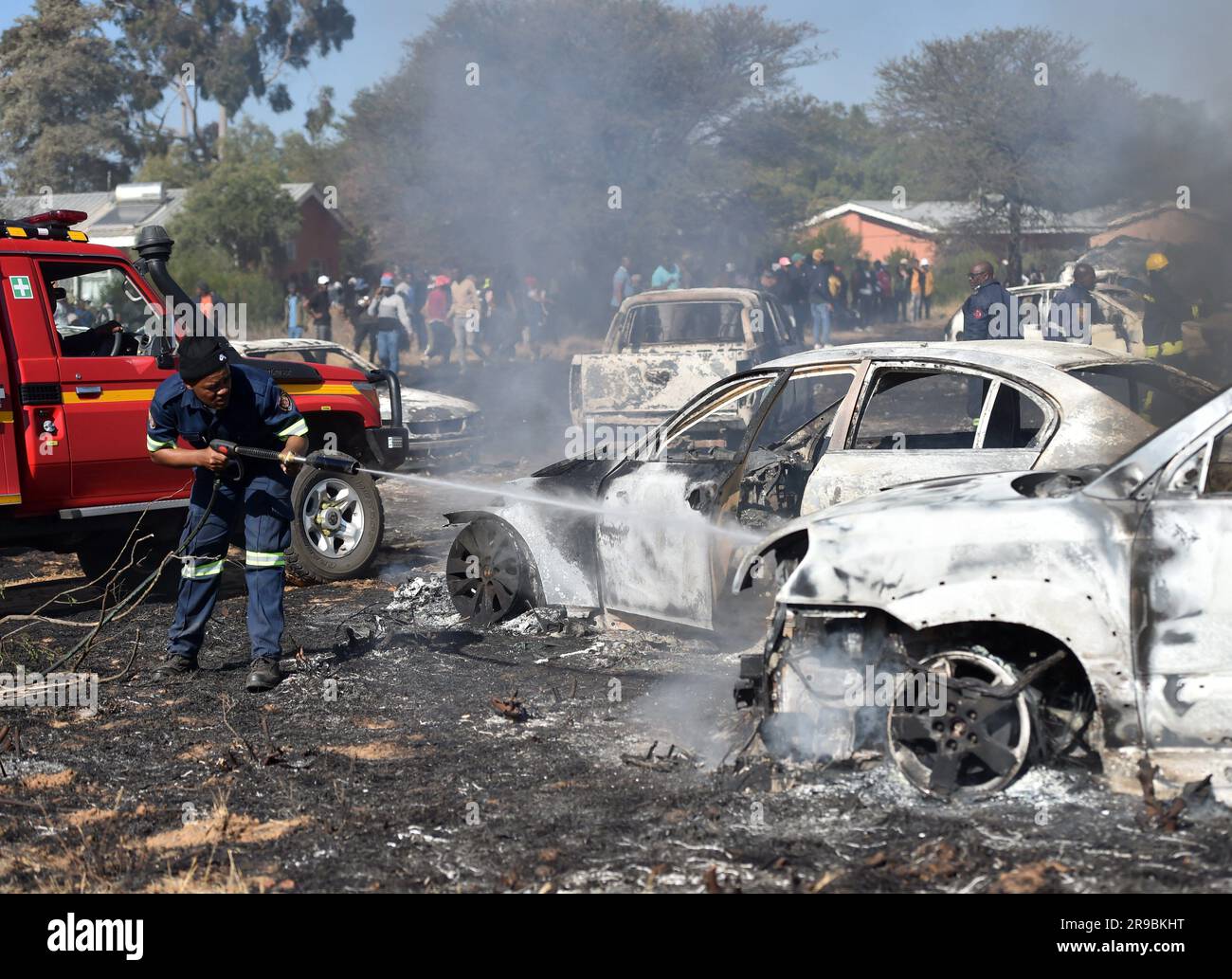 Jwaneng, Botswana. 25th June, 2023. A firefighter tries to put out fire ...