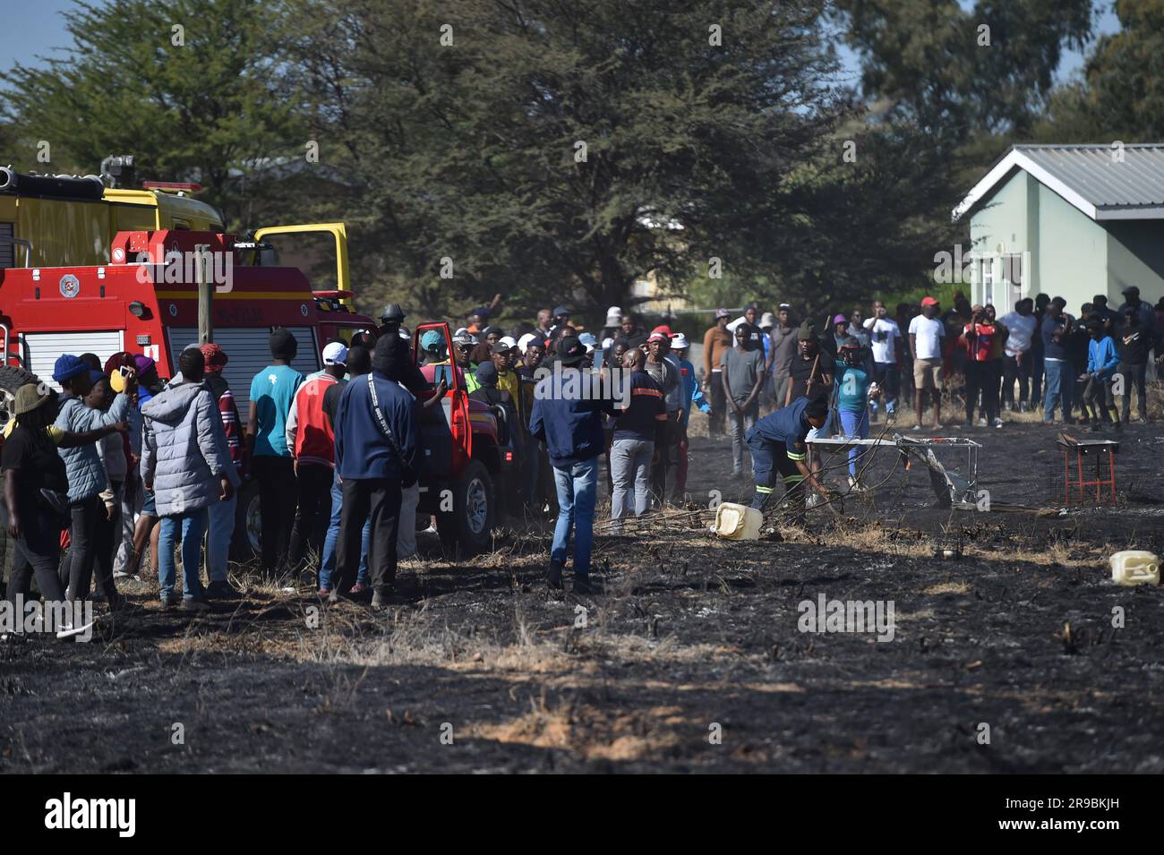Jwaneng, Botswana. 25th June, 2023. People gather at a site where cars ...