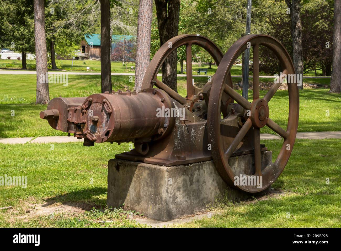 An old, rusty piece of machinery used in the oil industry on display at ...