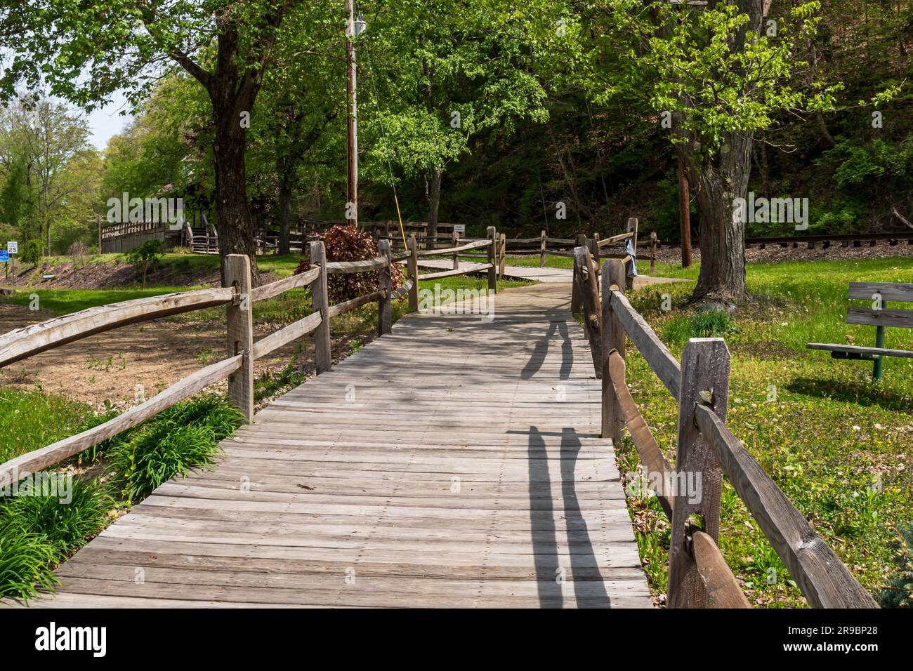A wooden walkway on the ground of the Drake Well Museum and Park in ...