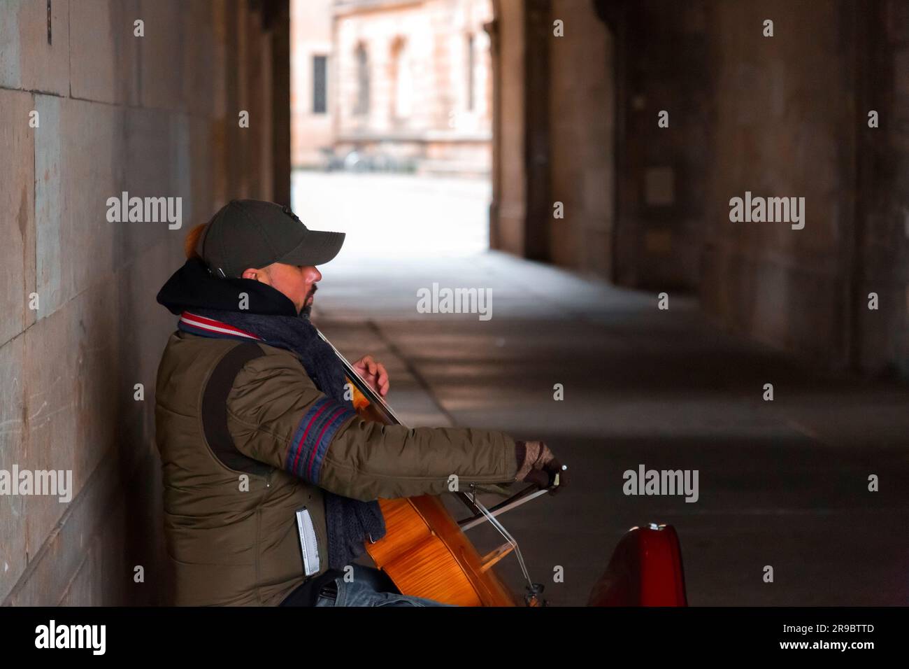 Dresden, Germany - December 19, 2021: Young male musician playing a ...